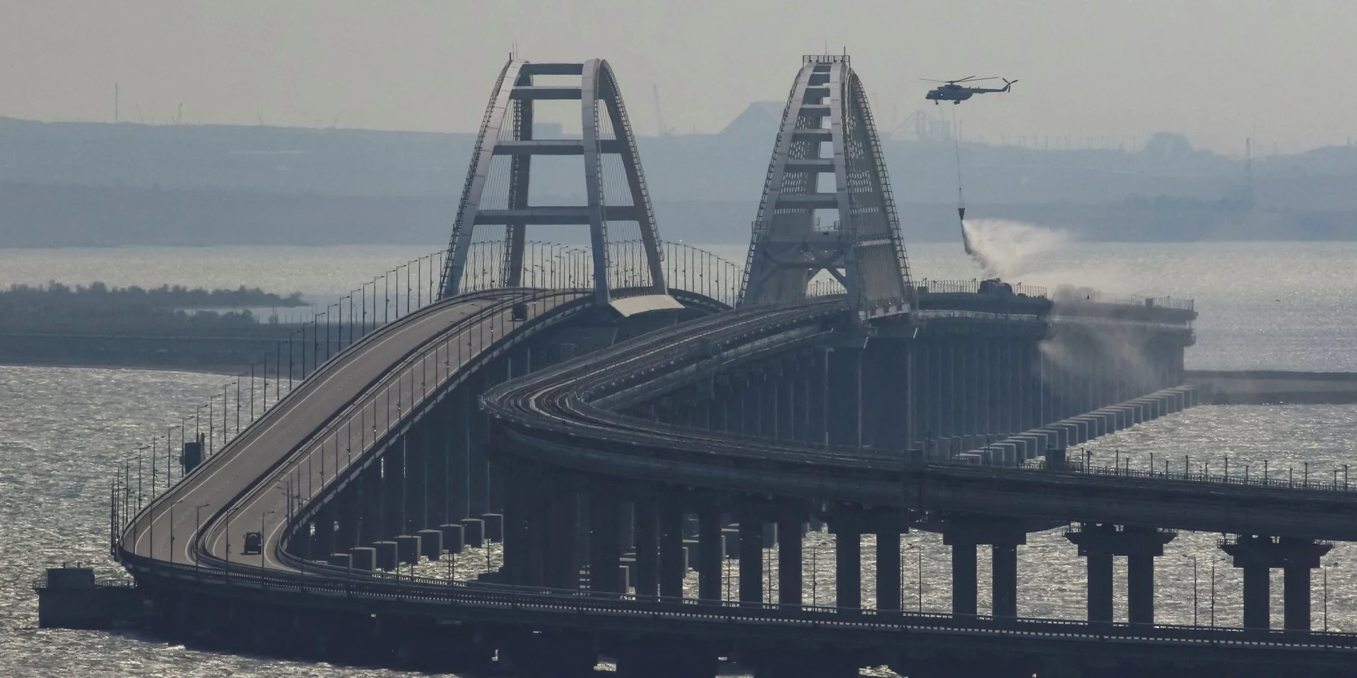 Putin steps up Crimean bridge security after blast / The New Voice of ...