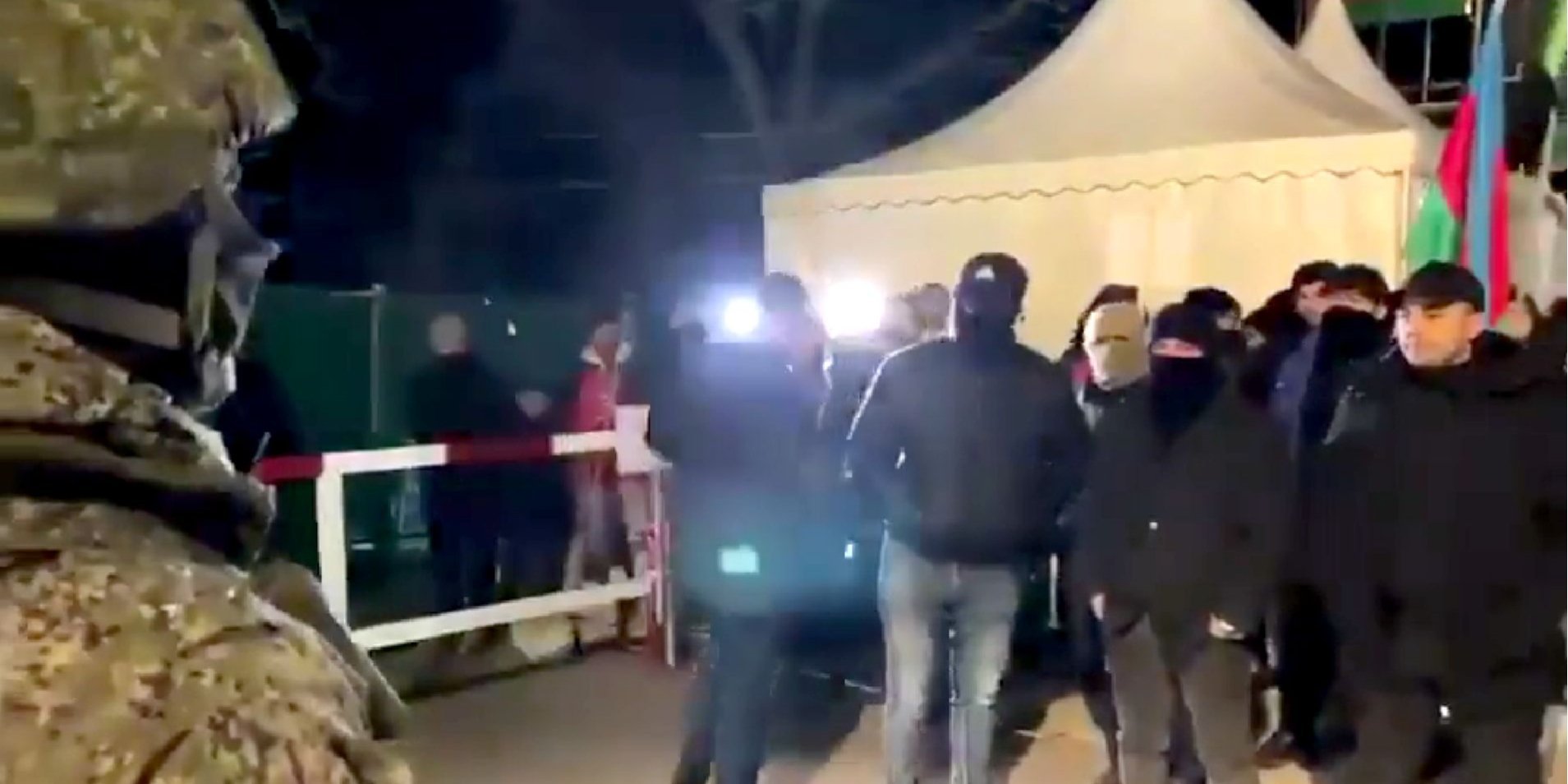 Azeri activists block Russian military column from crossing road in ...